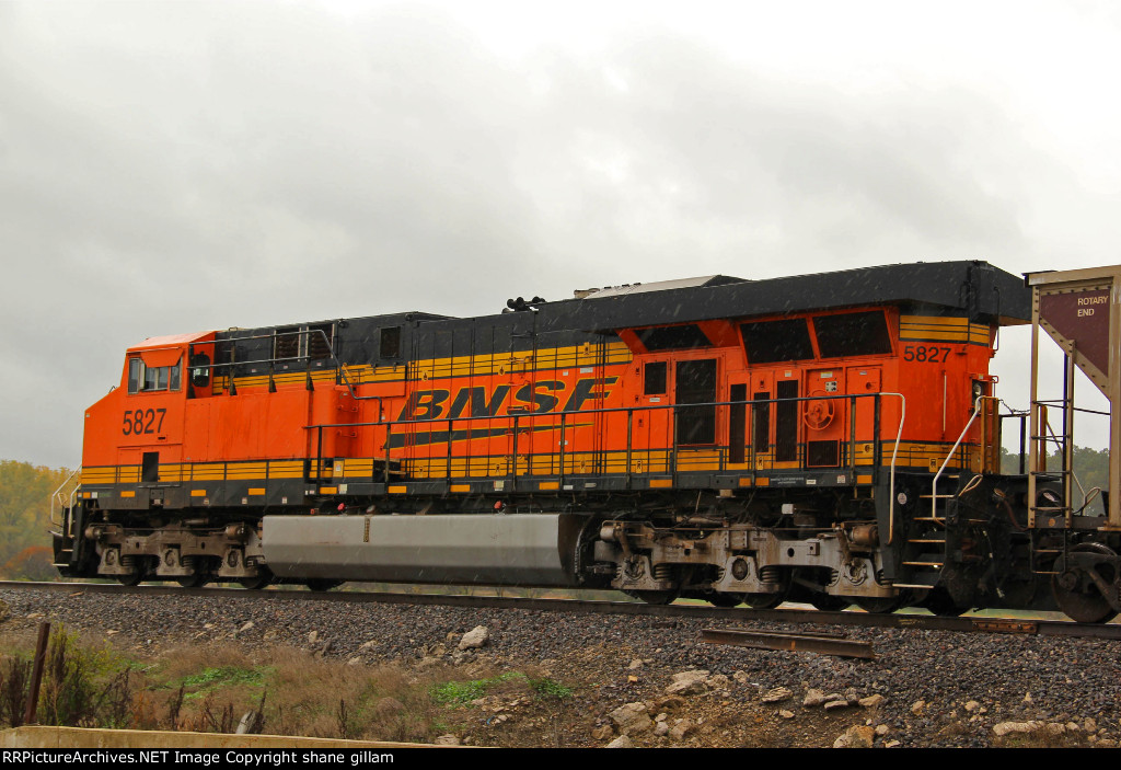 BNSF 5827 runs dpu in a rain storm.